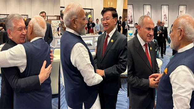 PM Modi meets world leaders on sidelines of SCO Summit reception in ...