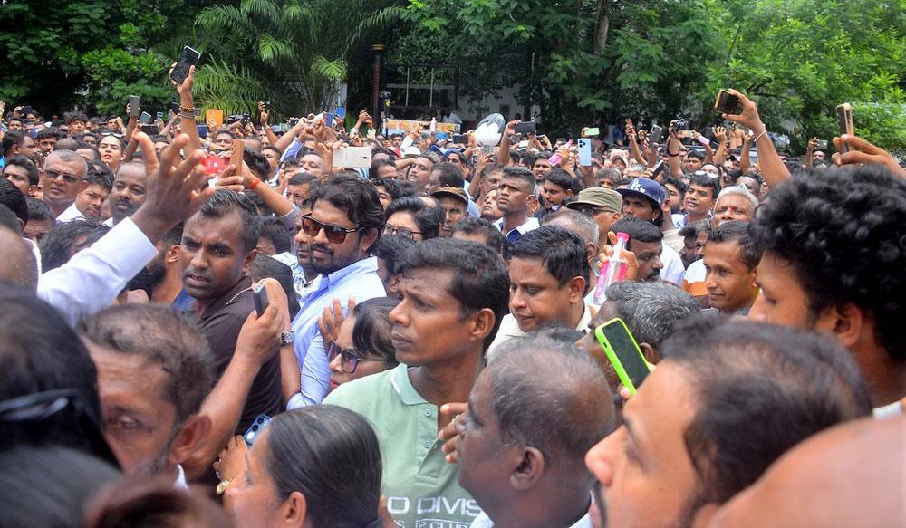 Large crowds outside to see MR - Caption Story | Daily Mirror