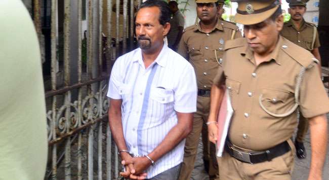 Handcuffed... - Caption Story | Daily Mirror