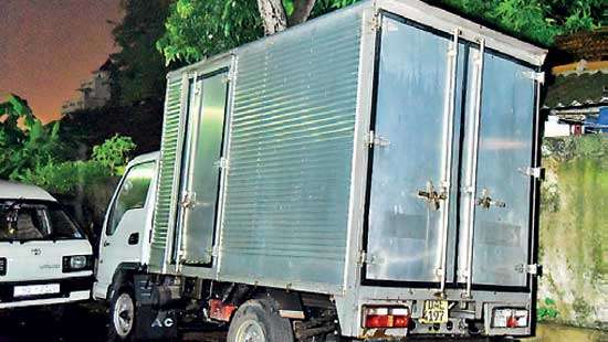 Suspicious lorry seized at Wattala - Front Page | Daily Mirror